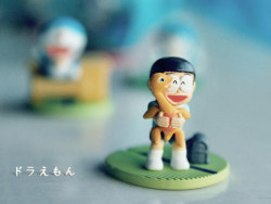 一组可爱哆啦A梦手板静物摄影照_dlam_bao-站酷ZCOOL