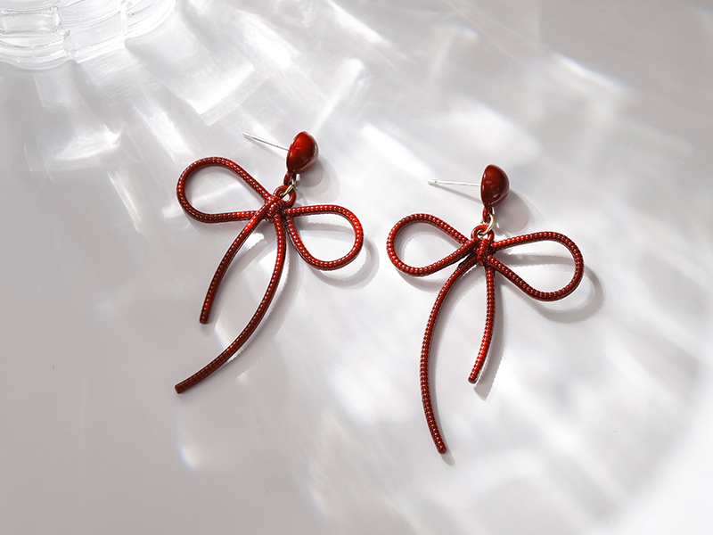 蝴蝶结耳钉_cous-站酷ZCOOL